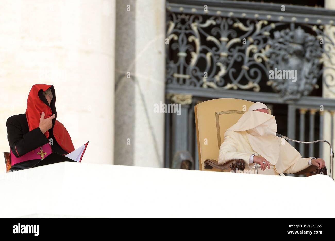 The wind blows the dress of Pope Francis as he leads his weekly general ...