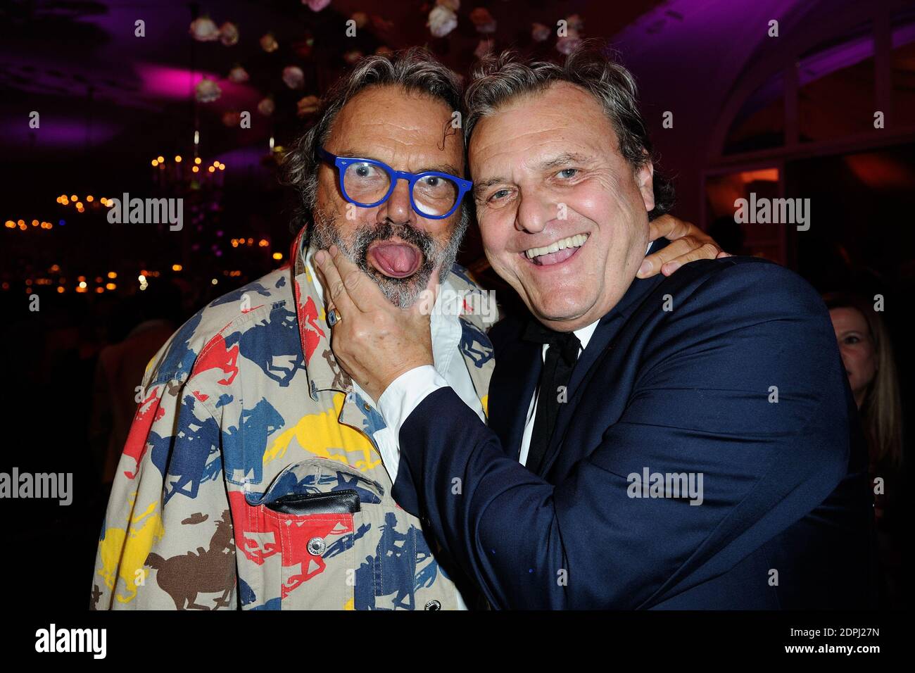 Oliviero Toscani and Jean-Charles de Castelbajac attending Kenzo's 50 ...