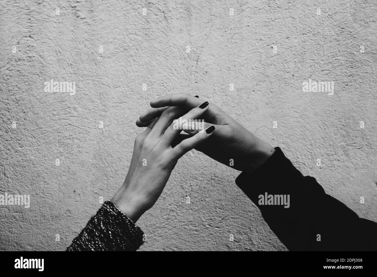 Hands Against Wall Stock Photo - Alamy