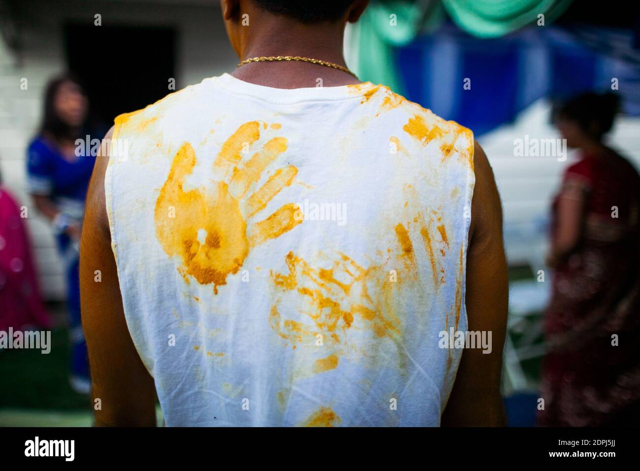 Rear View Of Man With Hand Prints On Clothes Stock Photo - Alamy