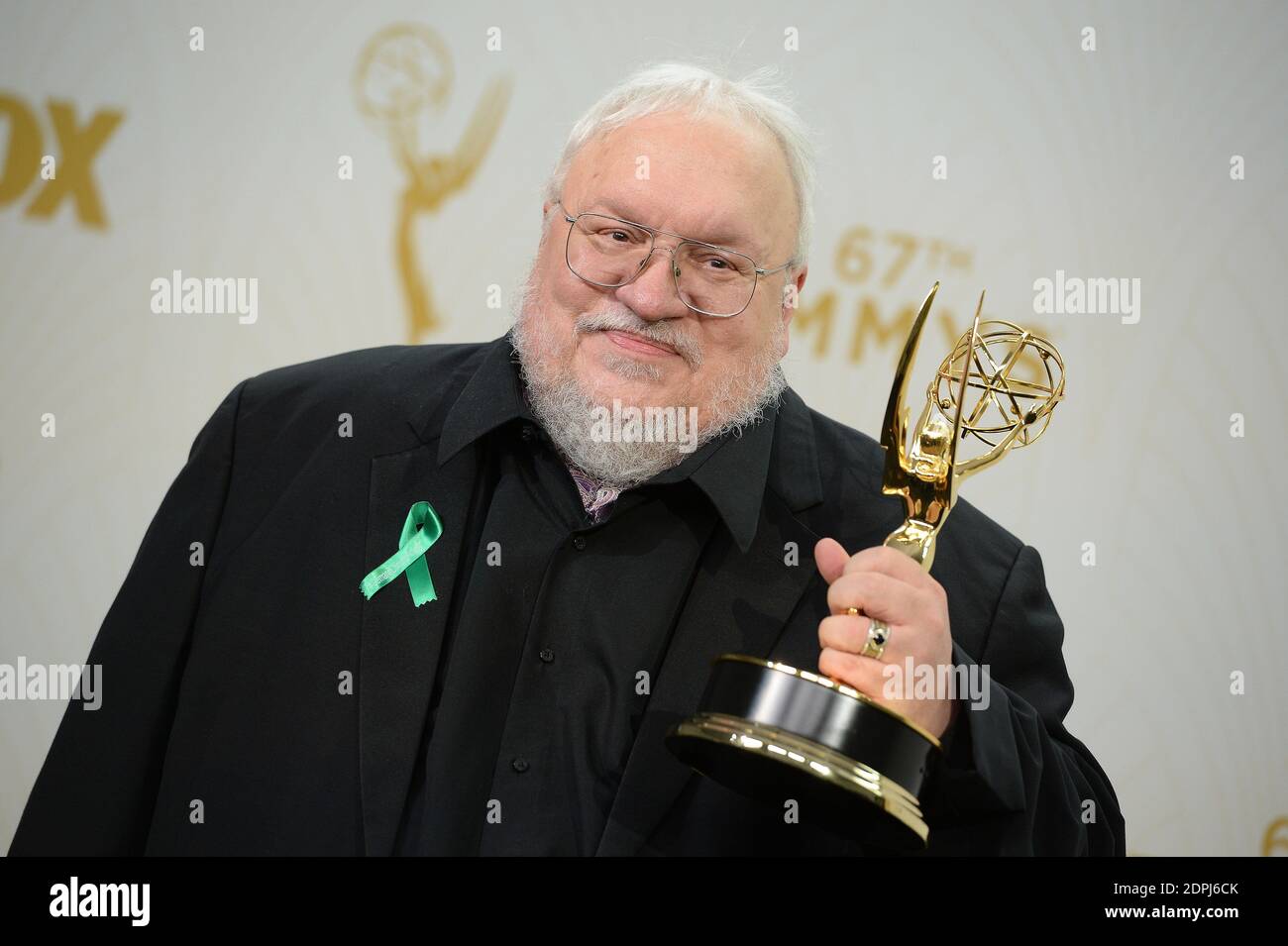 George R. R. Martin poses in the press room of the 67th Emmy Awards at ...