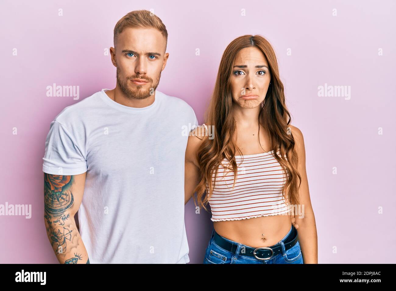 Young couple of girlfriend and boyfriend hugging and standing together ...