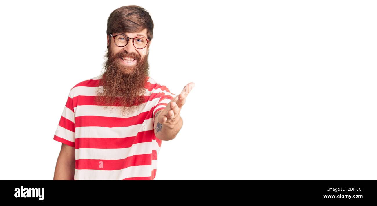 Handsome Young Red Head Man With Long Beard Wearing Casual Clothes