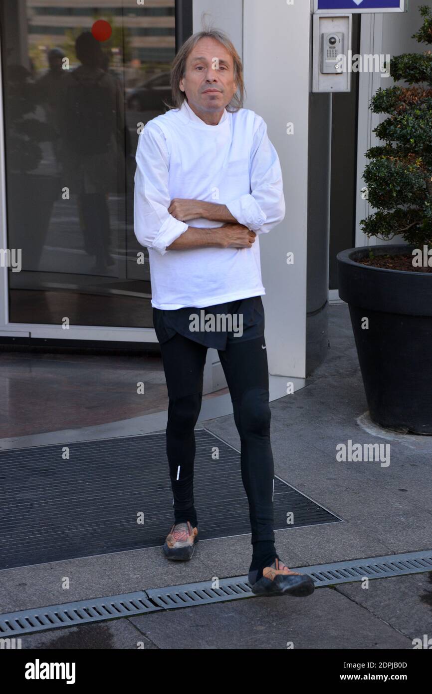 French urban climber Alain Robert nicknamed 'Spiderman' climbing French ...