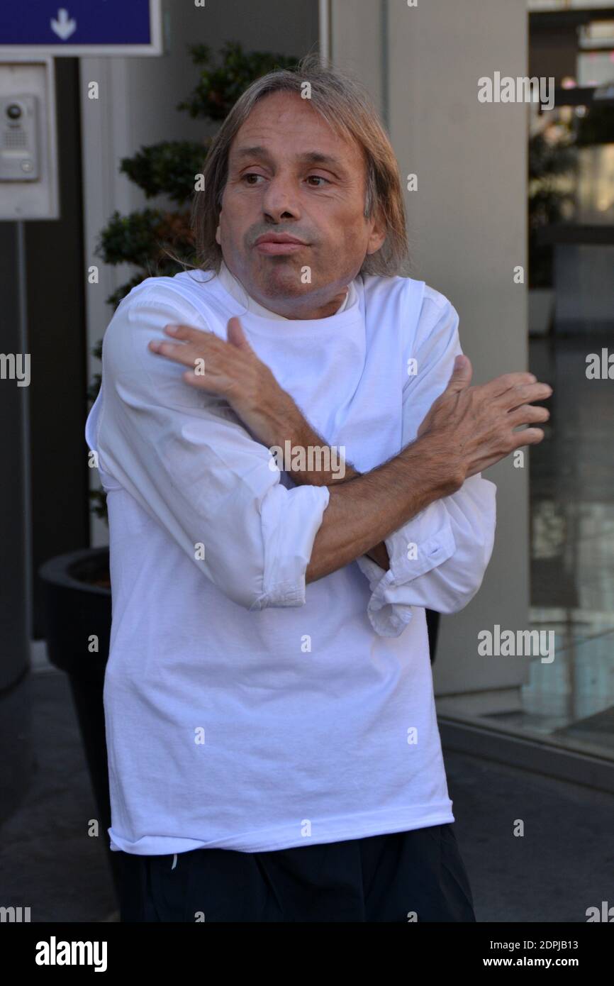 French urban climber Alain Robert nicknamed 'Spiderman' climbing French ...