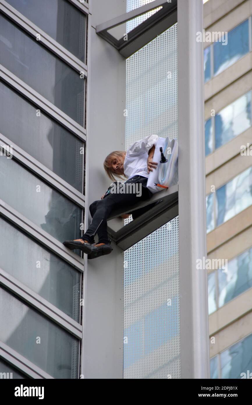 French urban climber Alain Robert nicknamed 'Spiderman' climbing French ...