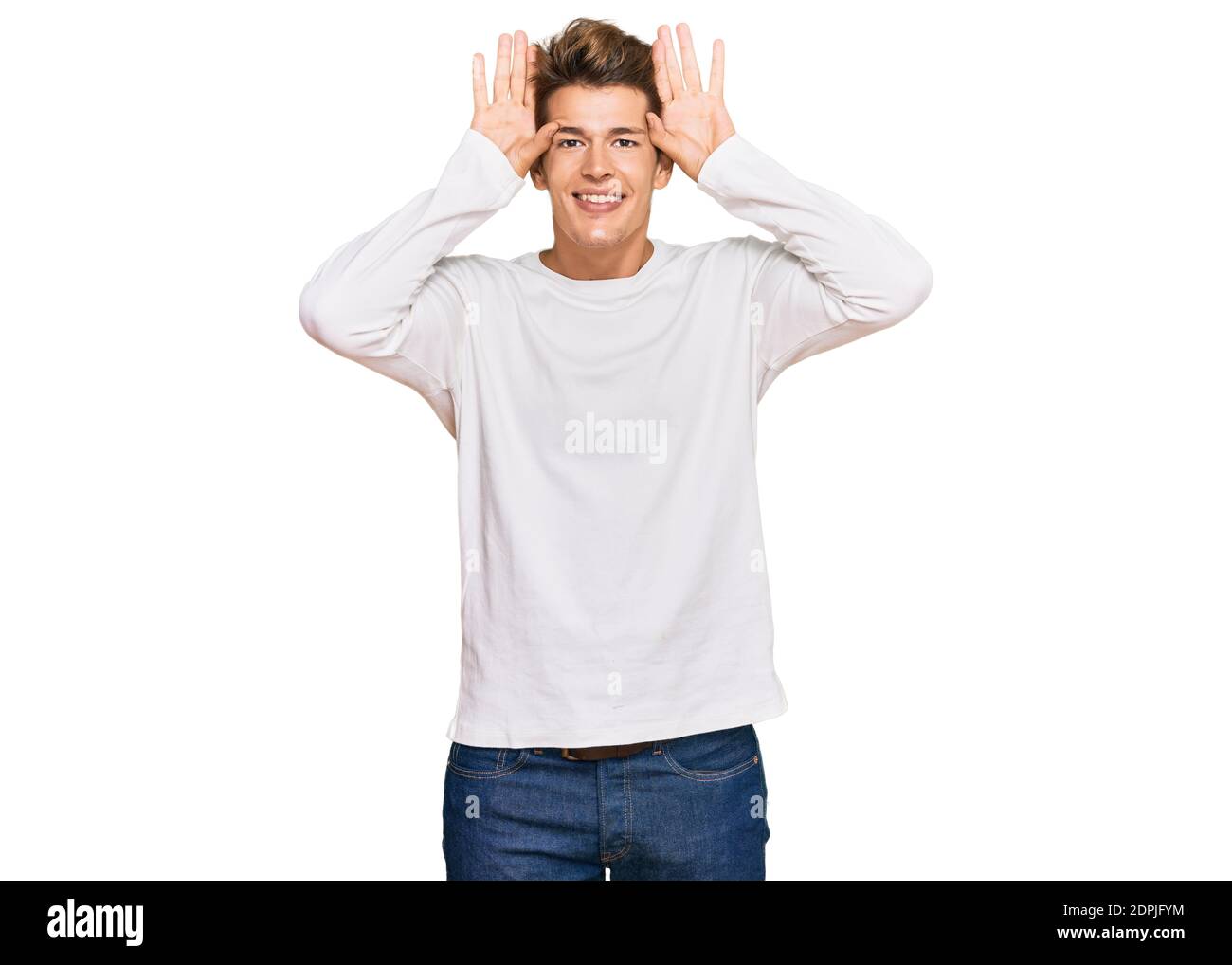Handsome caucasian man wearing casual white sweater smiling cheerful ...