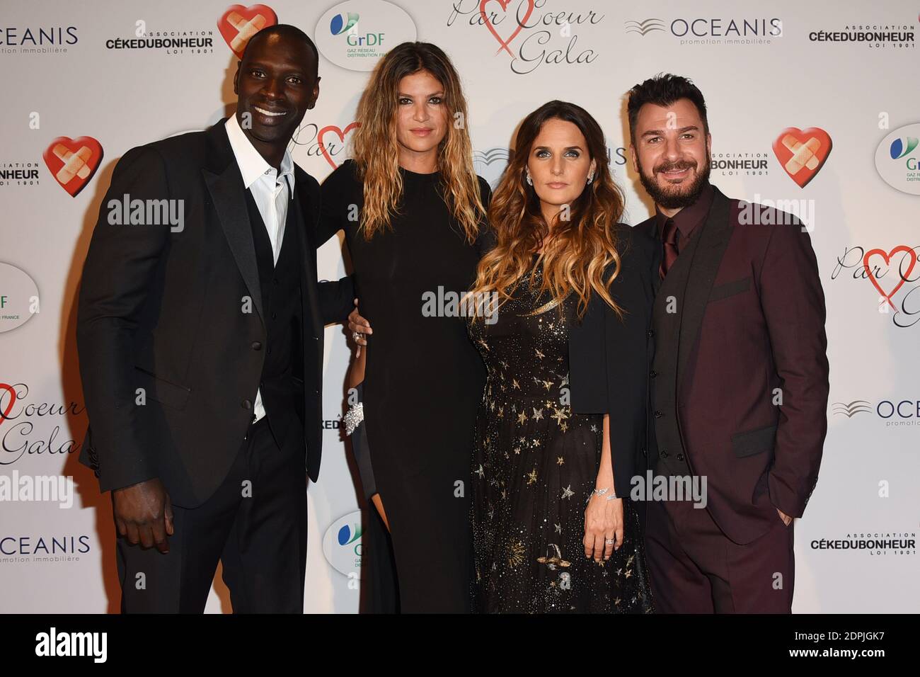 Omar Sy and Helene Sy, Isabelle Funaro and Michael Youn attending the ...