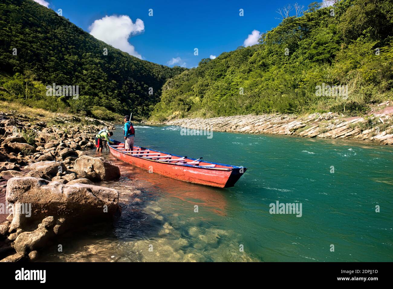 Preparing to portage on the way to Tamul Falls, Tampaon River, San Luis ...