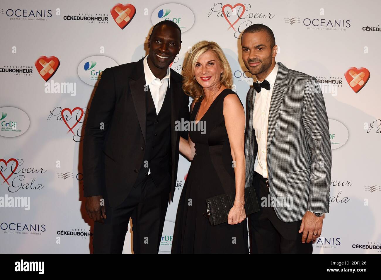 Omar Sy, Michelle Laroque and Tony Parker attending the 'Par Coeur ...