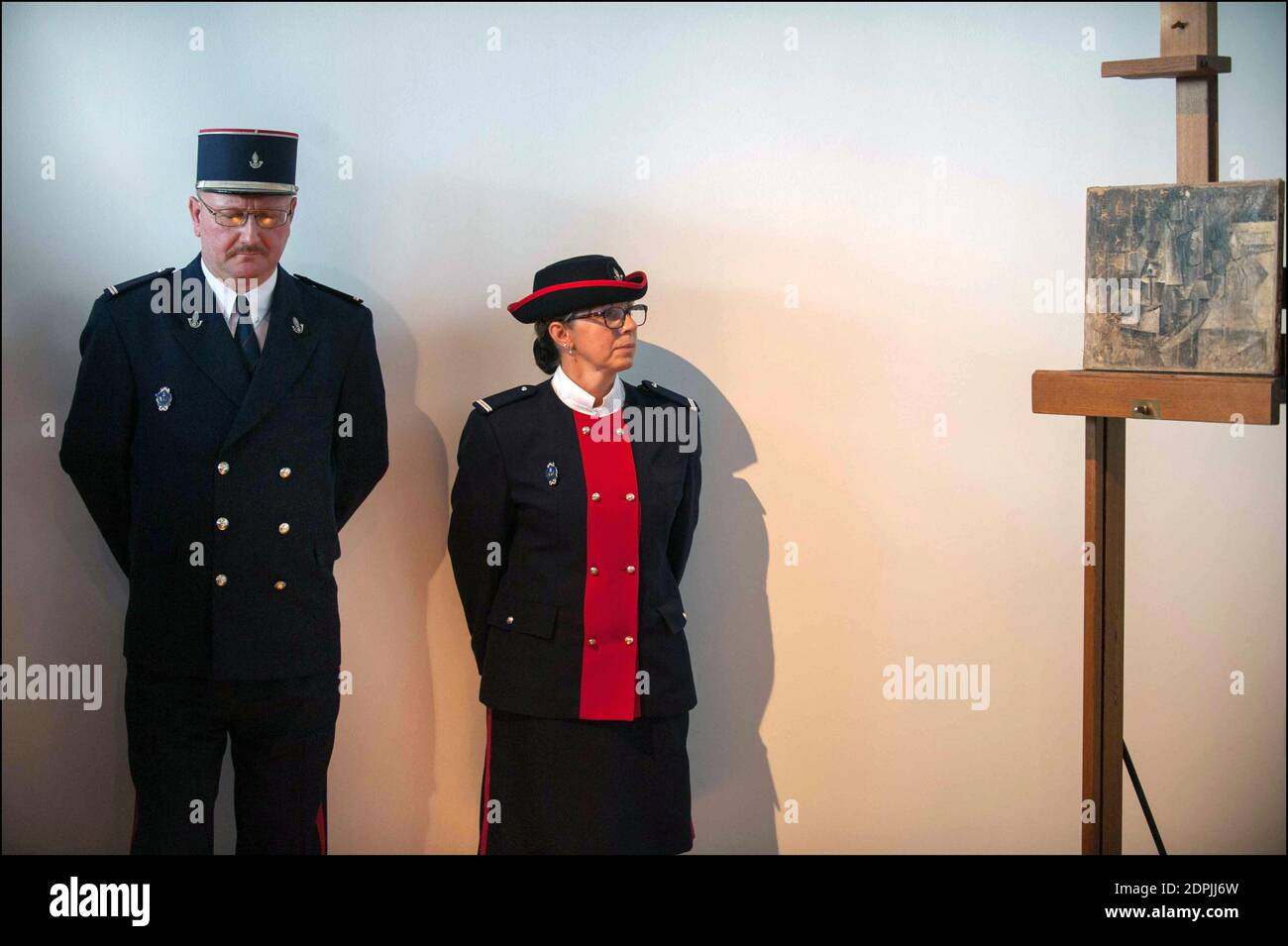 French customs officer stand next to The hairdresser (La Coiffeuse ...