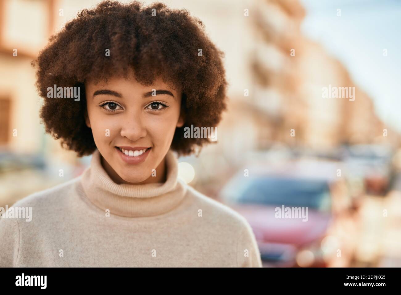 Young hispanic girl smiling happy standing at the city Stock Photo - Alamy