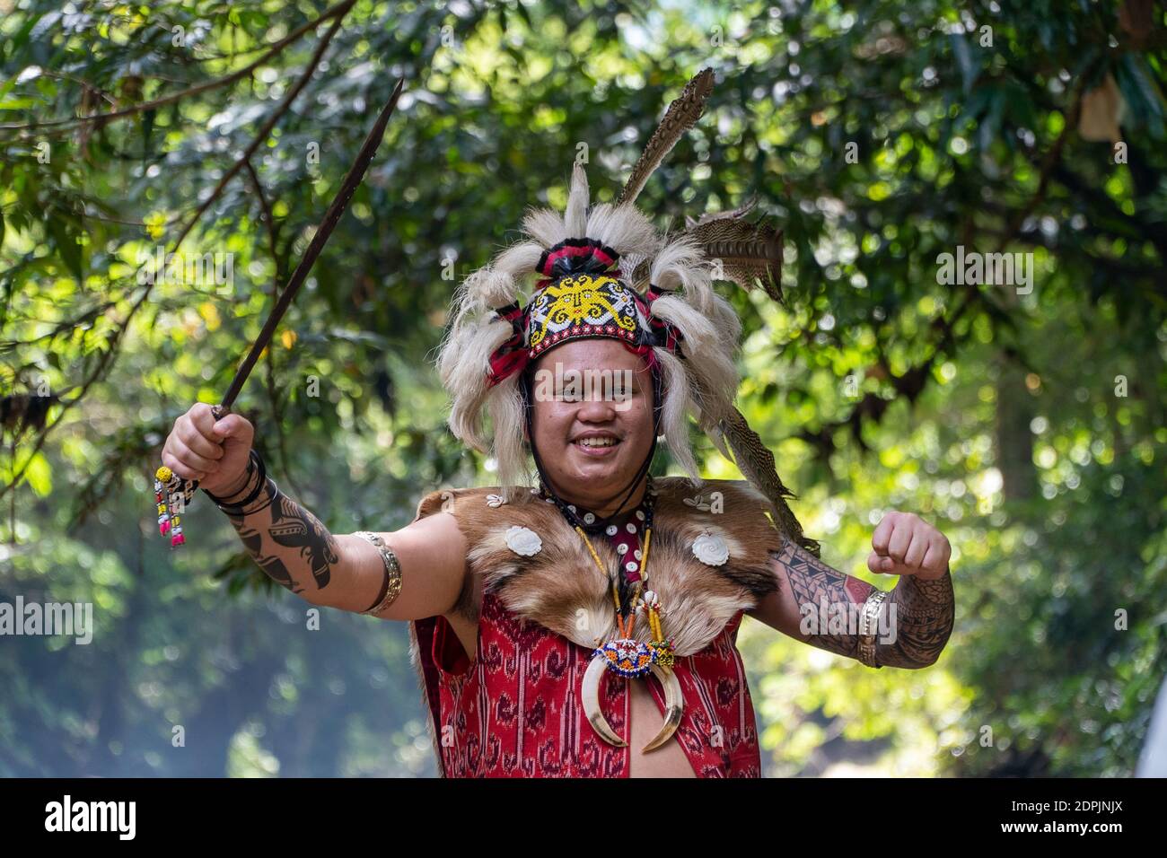 The Action Of A Borneo Dayak Warrior Stock Photo - Alamy