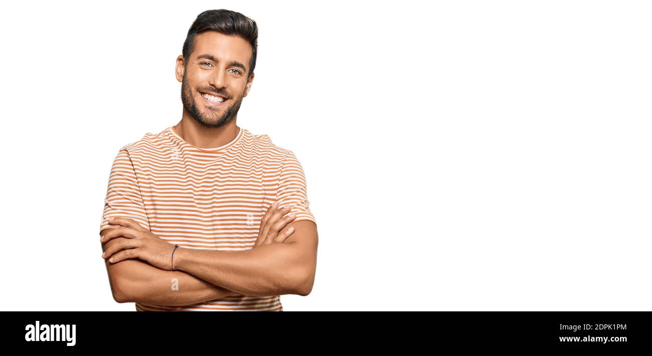 Laughing handsome latino man arms hi-res stock photography and images ...