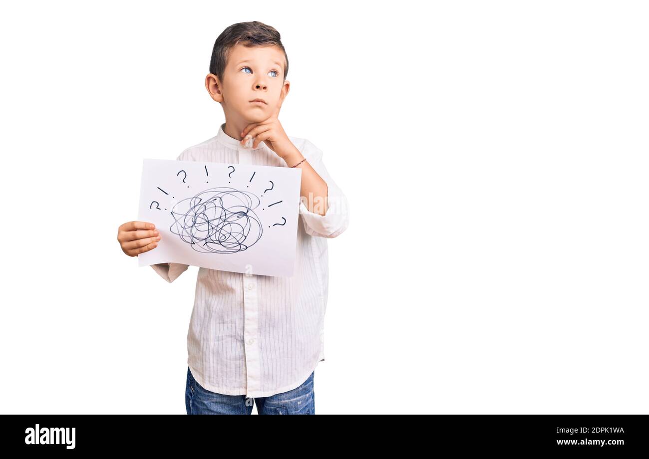 Cute blond kid holding scribble draw serious face thinking about ...