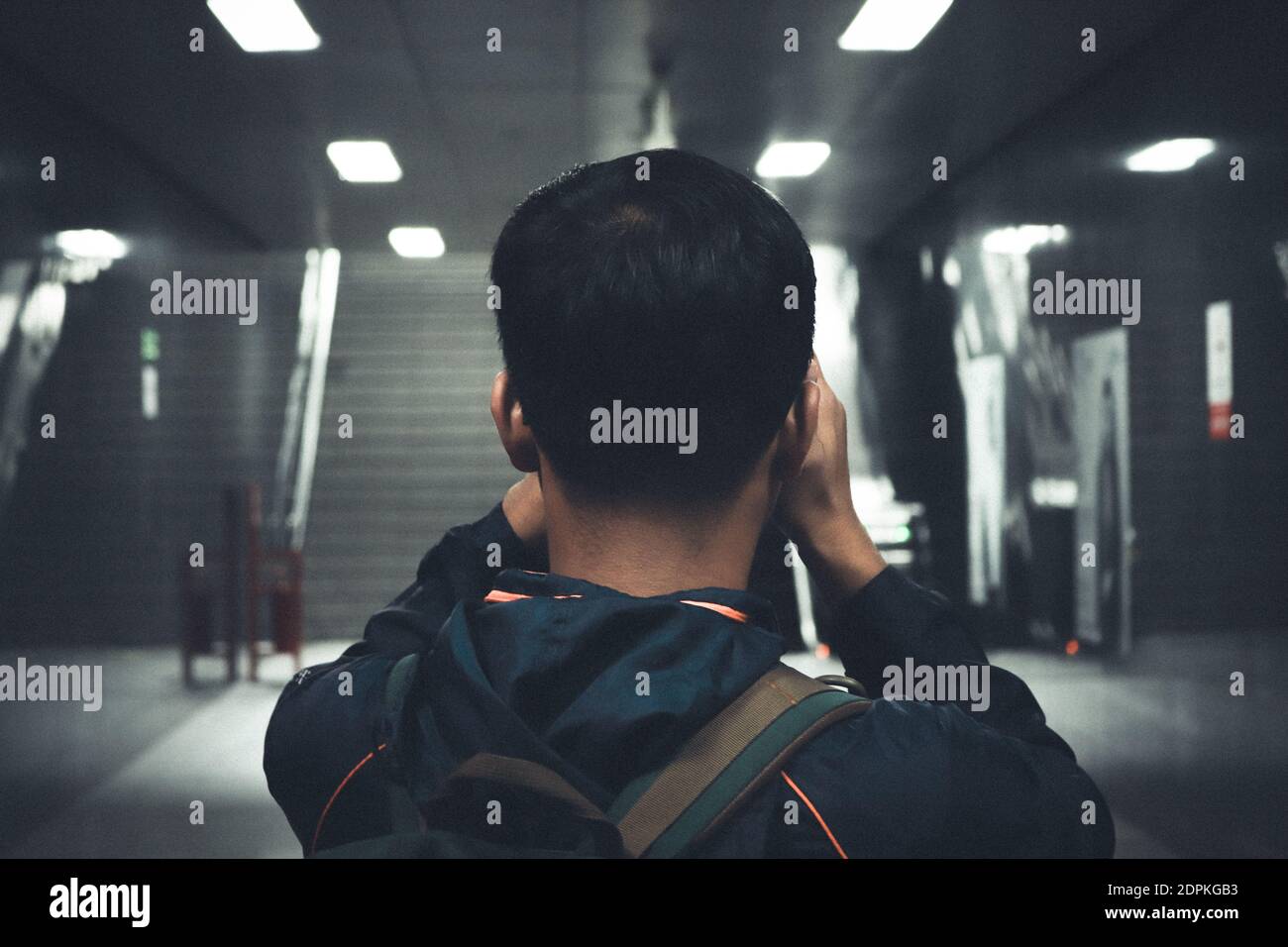 Rear View Portrait Of Man Standing In Bus Stock Photo - Alamy