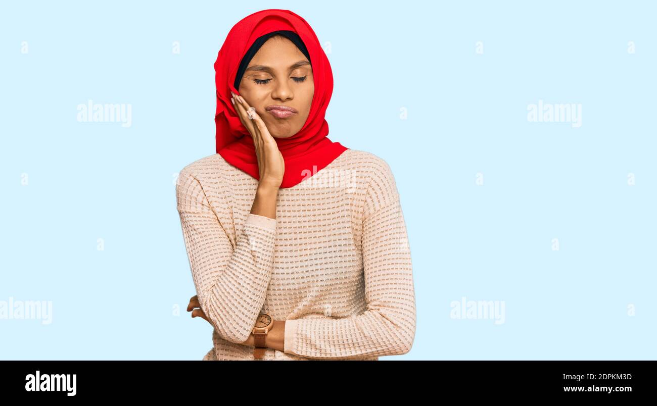 Young african american woman wearing traditional islamic hijab scarf ...