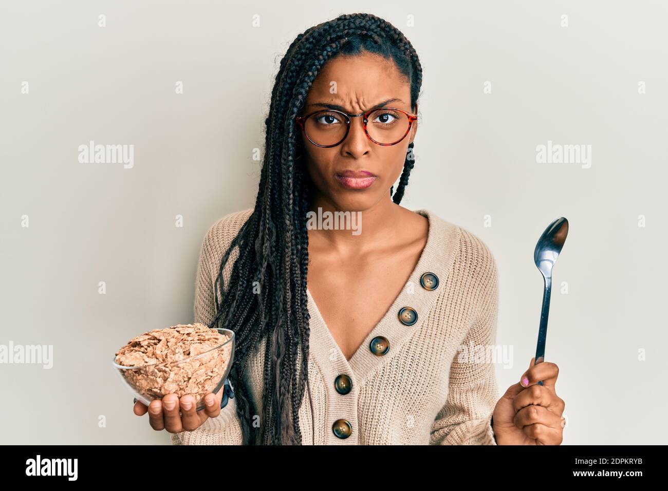 African eating oatmeal hi-res stock photography and images - Alamy