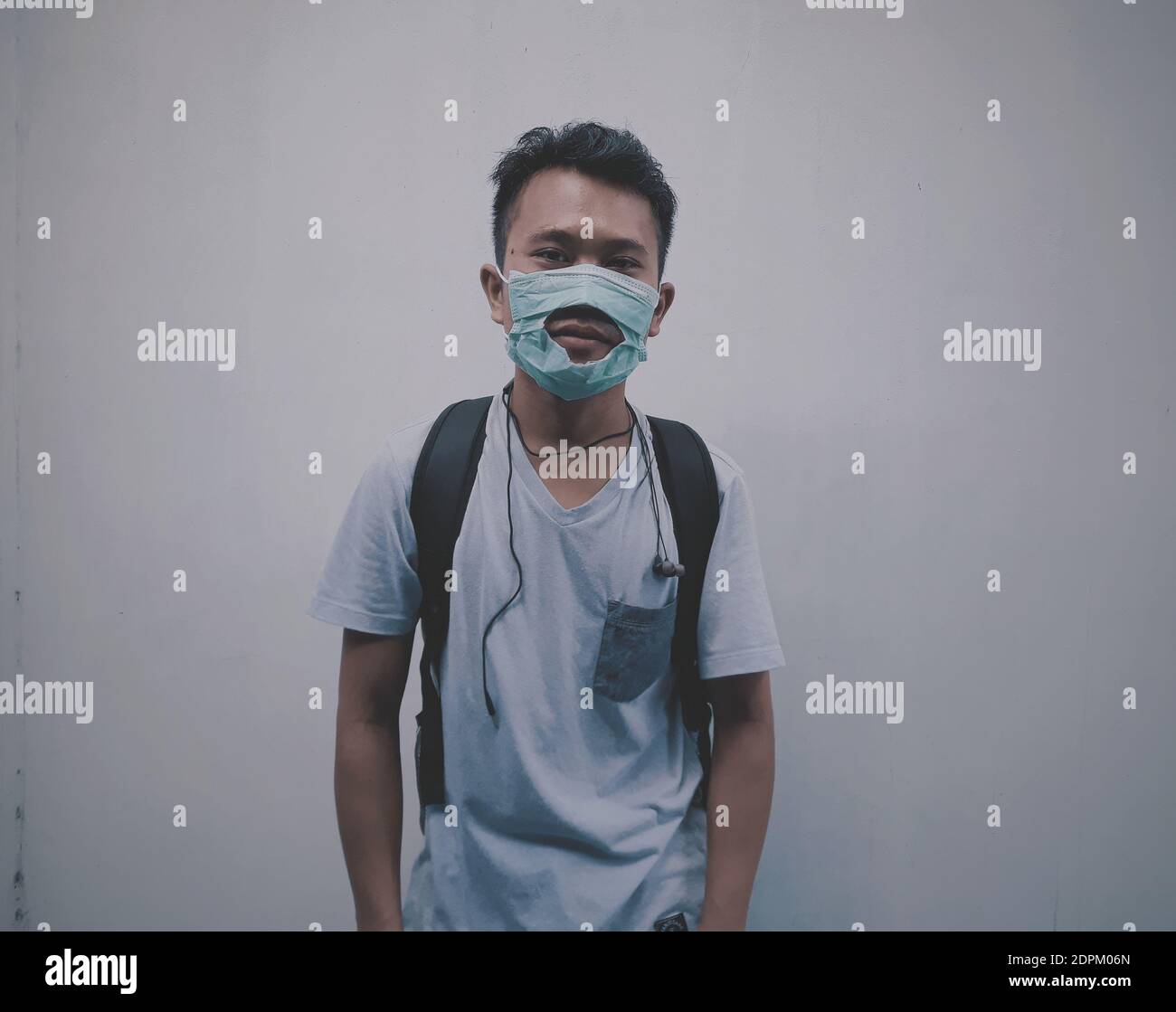 Torn face mask hi-res stock photography and images - Alamy