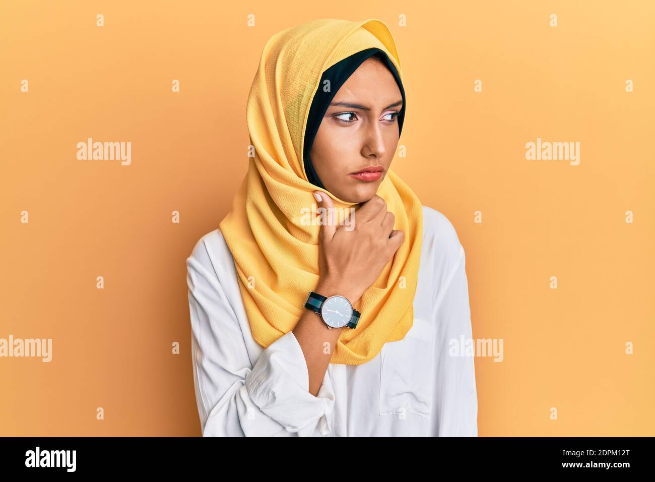 Young brunette arab woman wearing traditional islamic hijab scarf ...