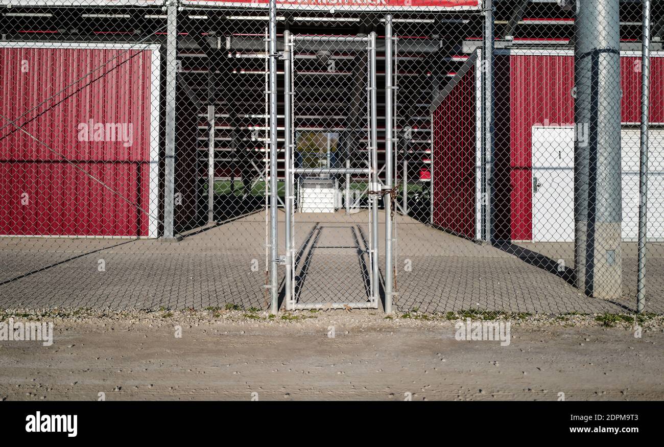 Closed And Locked Fence Gate To Football Field Stock Photo - Alamy