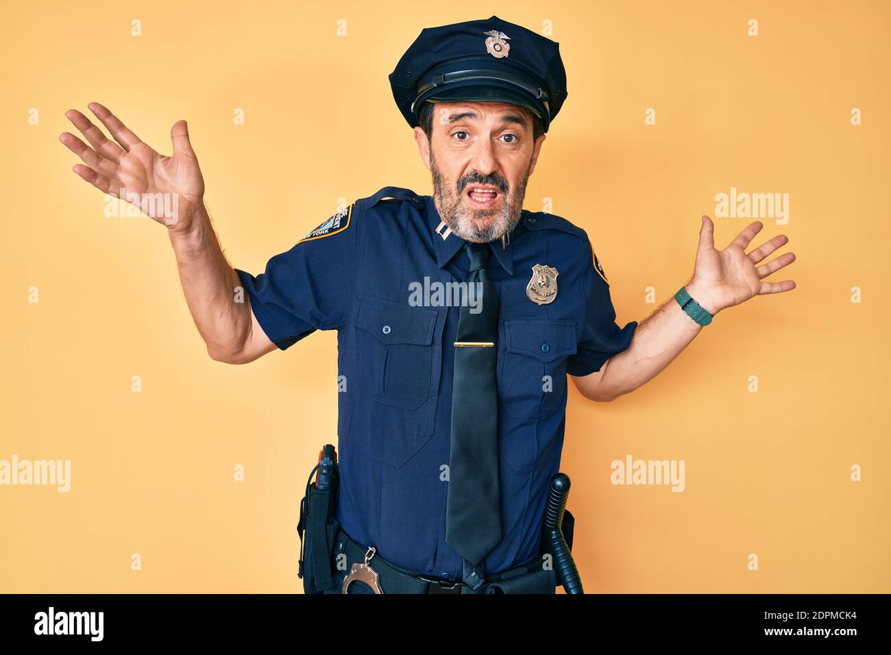 Shrugging cop hi-res stock photography and images - Alamy