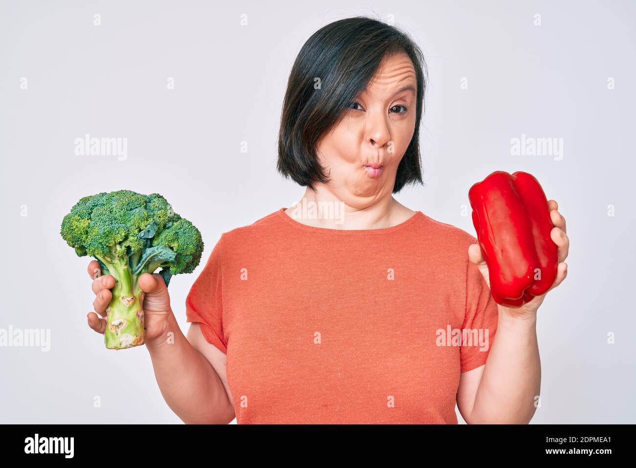 Fish broccoli woman hi-res stock photography and images - Alamy