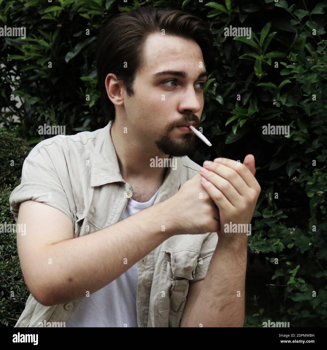 Man smoking cigarette france hi-res stock photography and images - Alamy