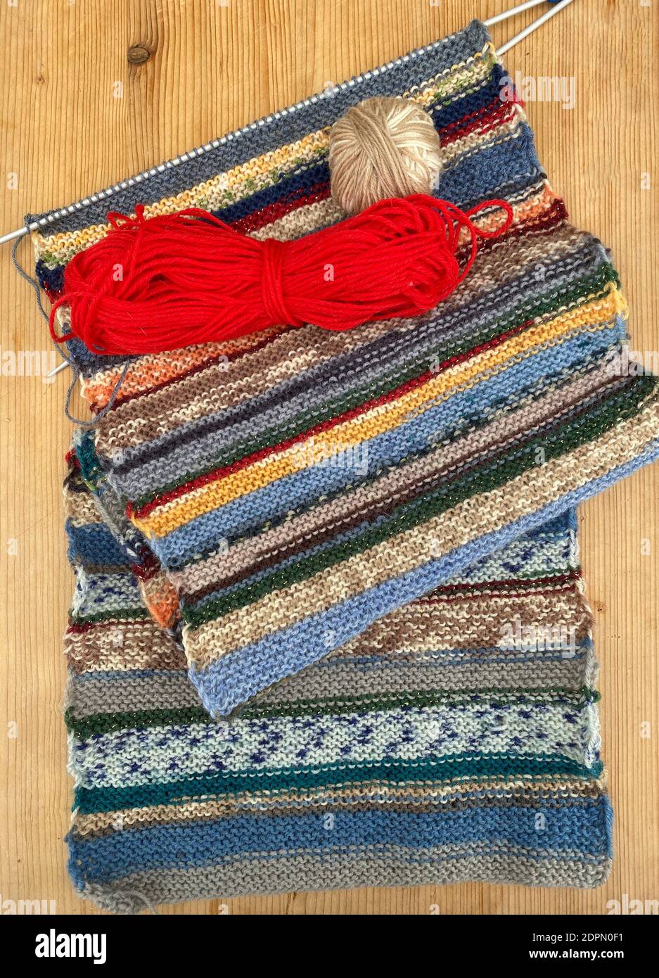 Knit A Scarf From Scraps Of Wool Stock Photo - Alamy