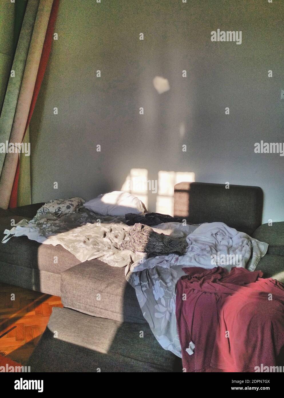 Messy Sofa At Home Stock Photo - Alamy