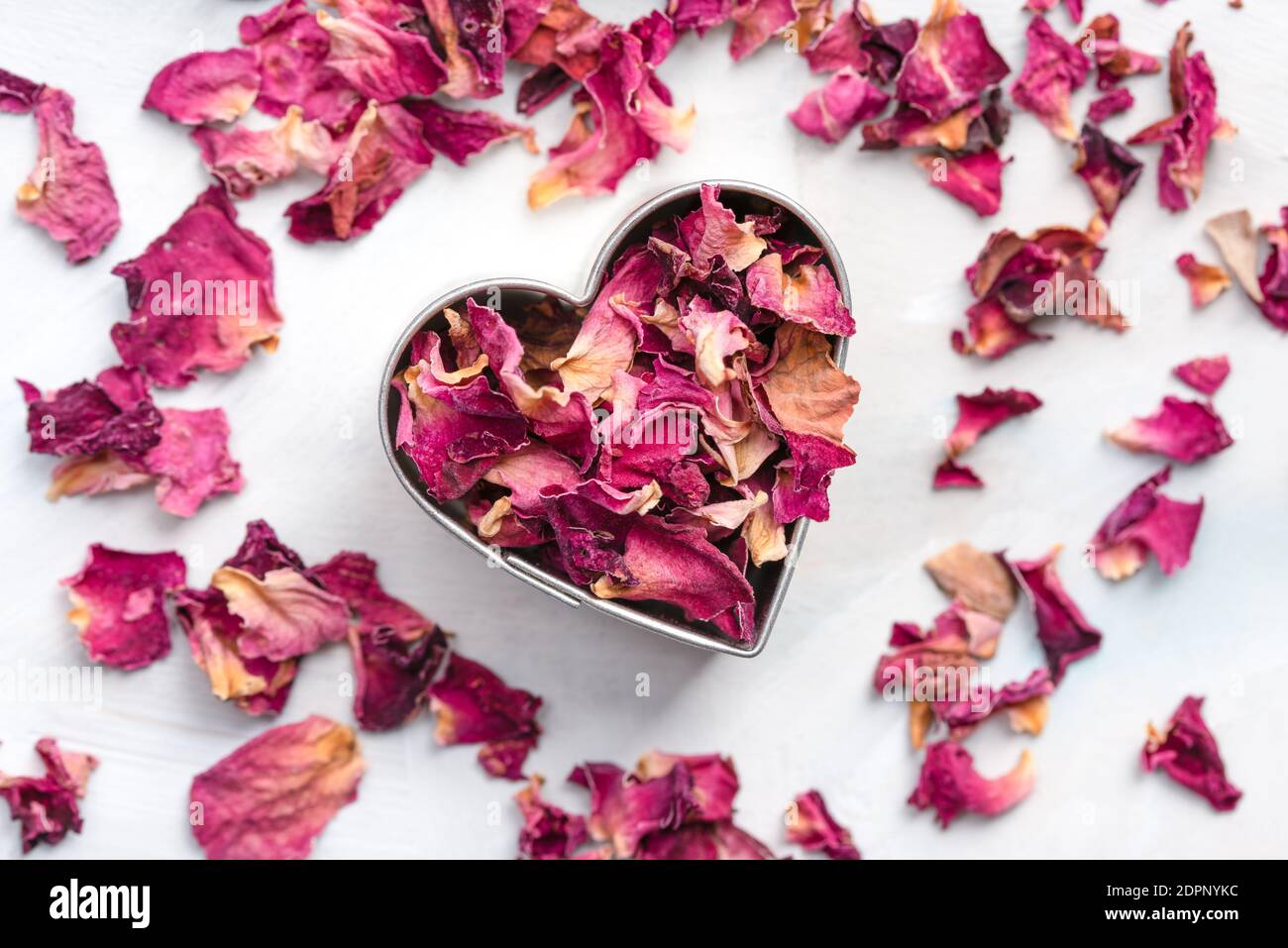 Dried Rose Petals in a Heart Shape Stock Photo - Alamy