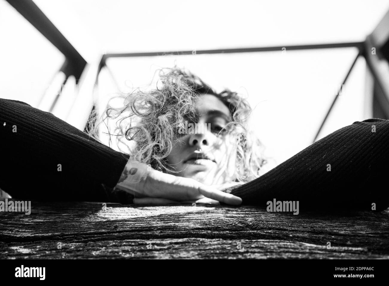 Leaning on hand Black and White Stock Photos & Images - Alamy