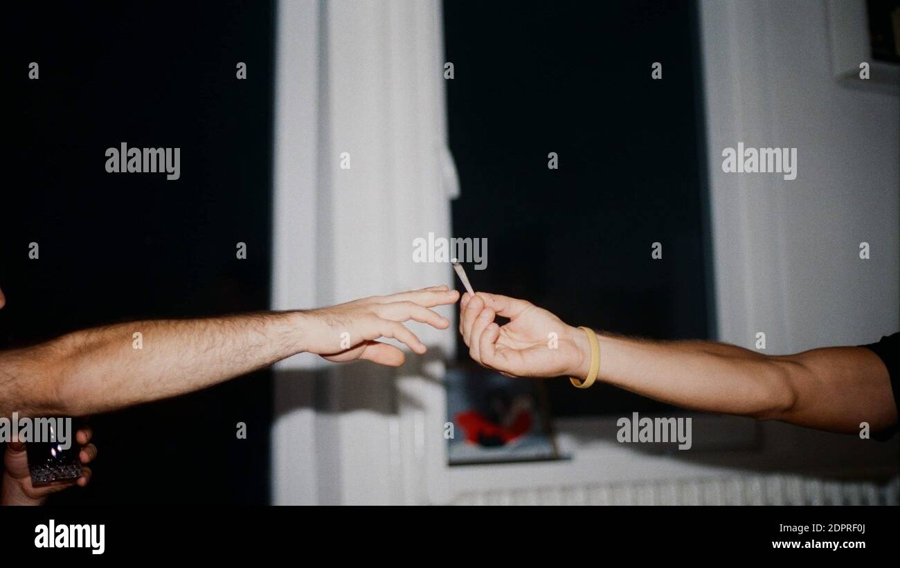 Passing joint and marijuana hi-res stock photography and images - Alamy