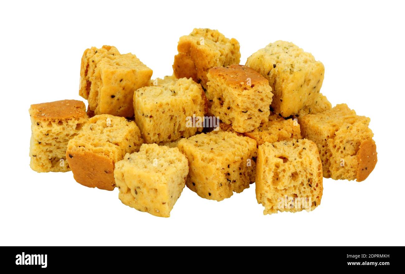 Group of baked crusty bread cube croutons isolated on a white ...