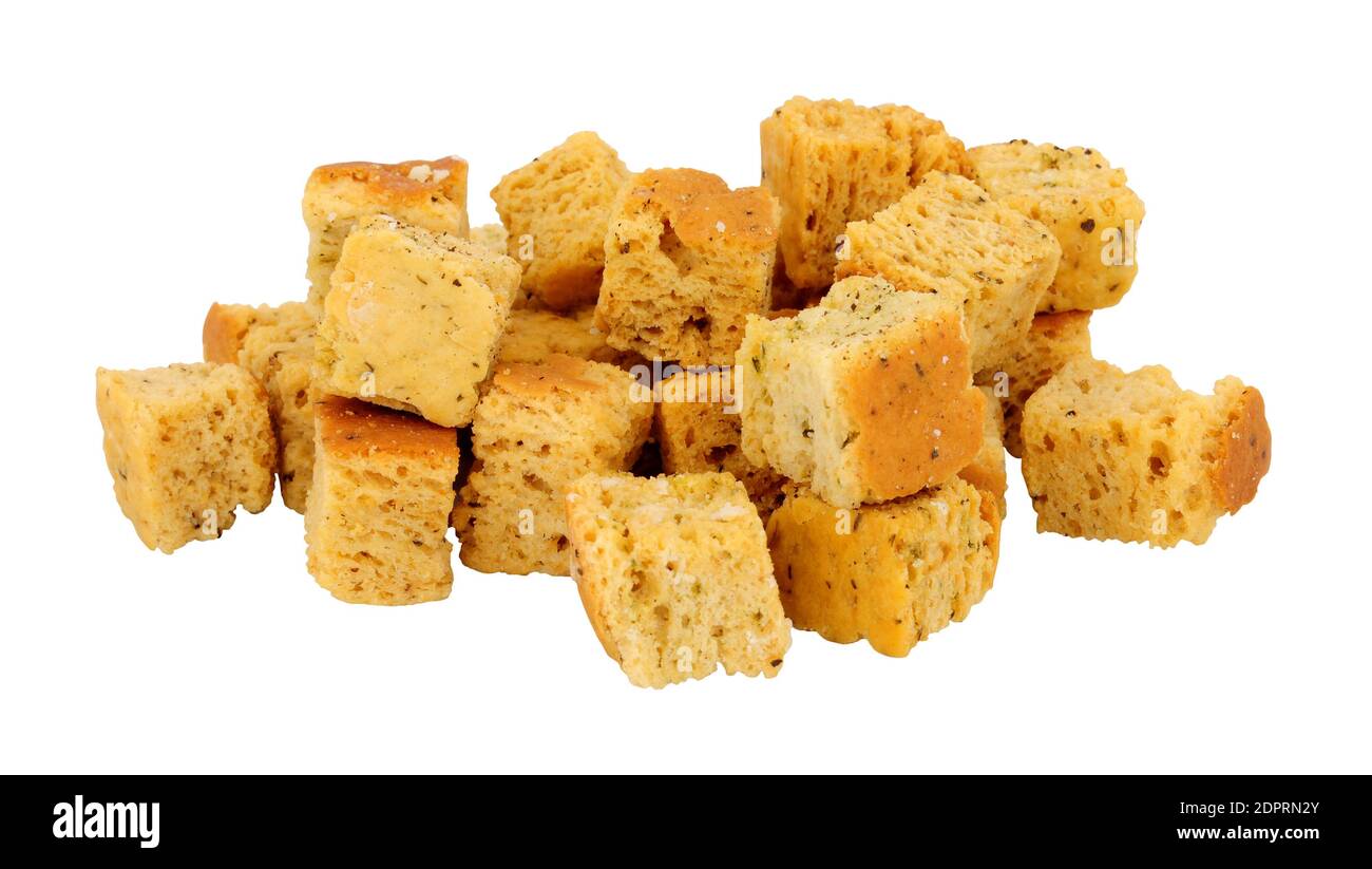 Group of baked crusty bread cube croutons isolated on a white ...