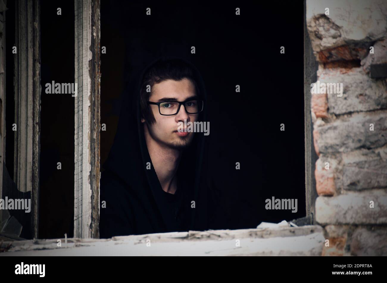 Open window boy teenager hi-res stock photography and images - Alamy