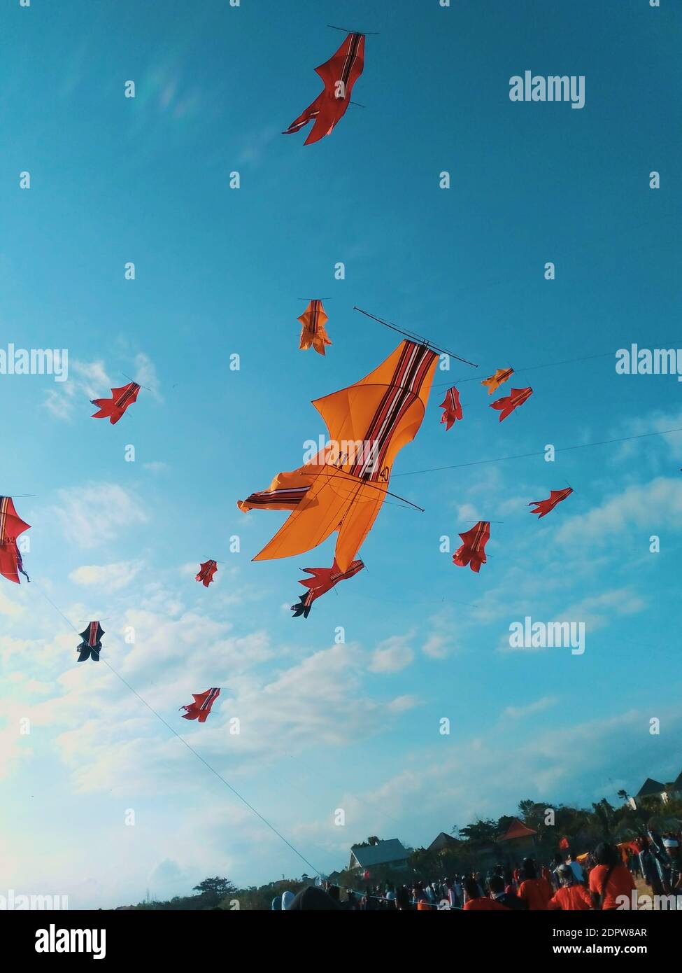 Low angle view of kites flying at kite festival hi-res stock ...