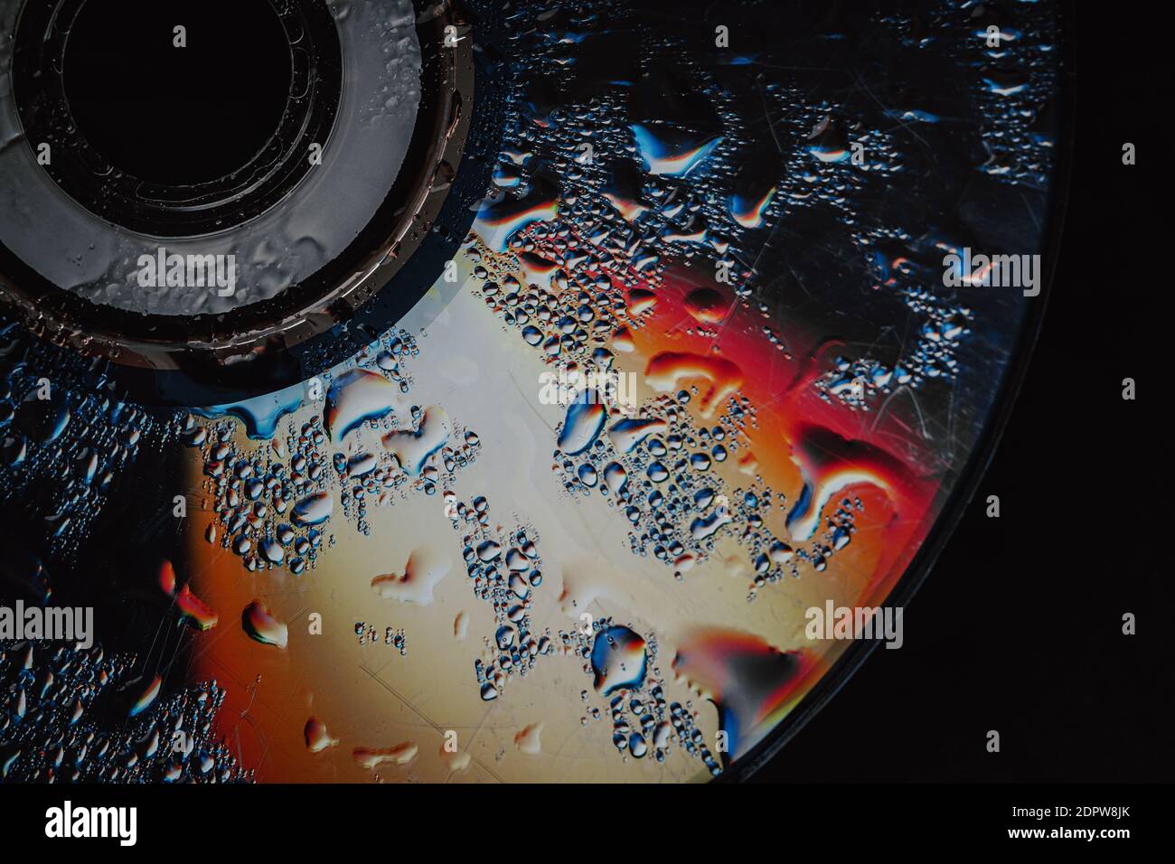 colorful Drops of water on the CD. abstract background. Soft focus ...