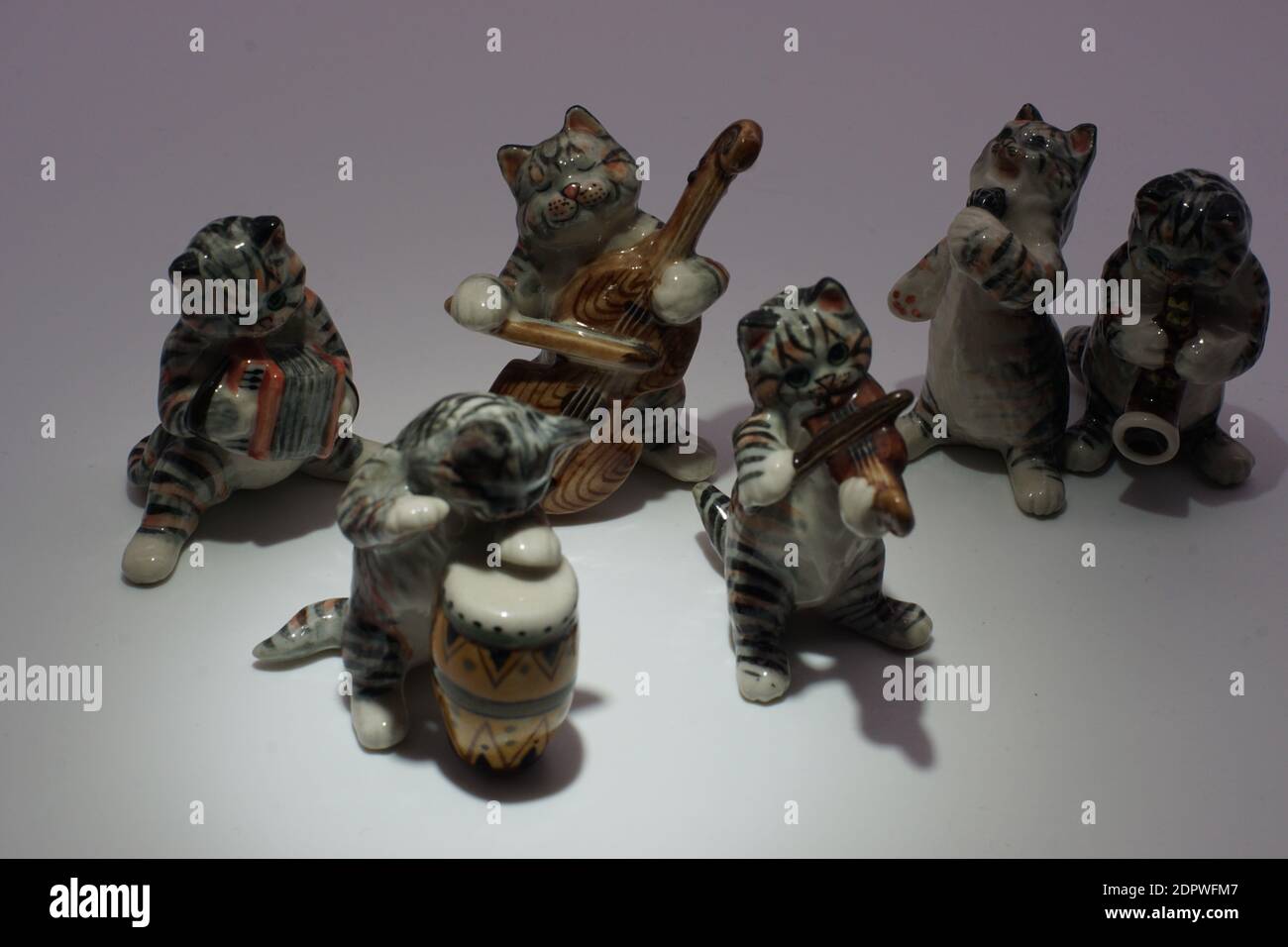 Cute decorative ceramic cat figurines playing different instruments ...