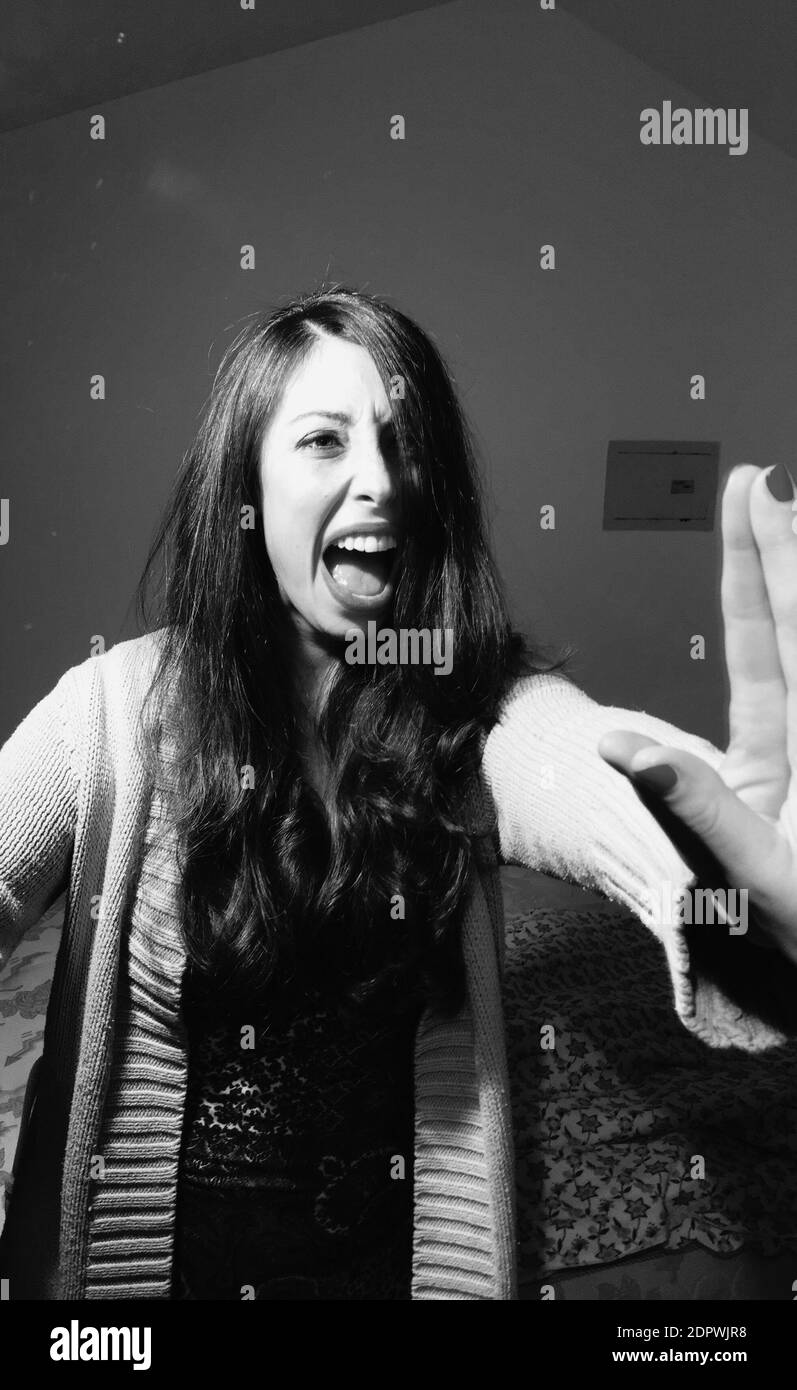 Woman Hair Screaming Black and White Stock Photos & Images - Alamy