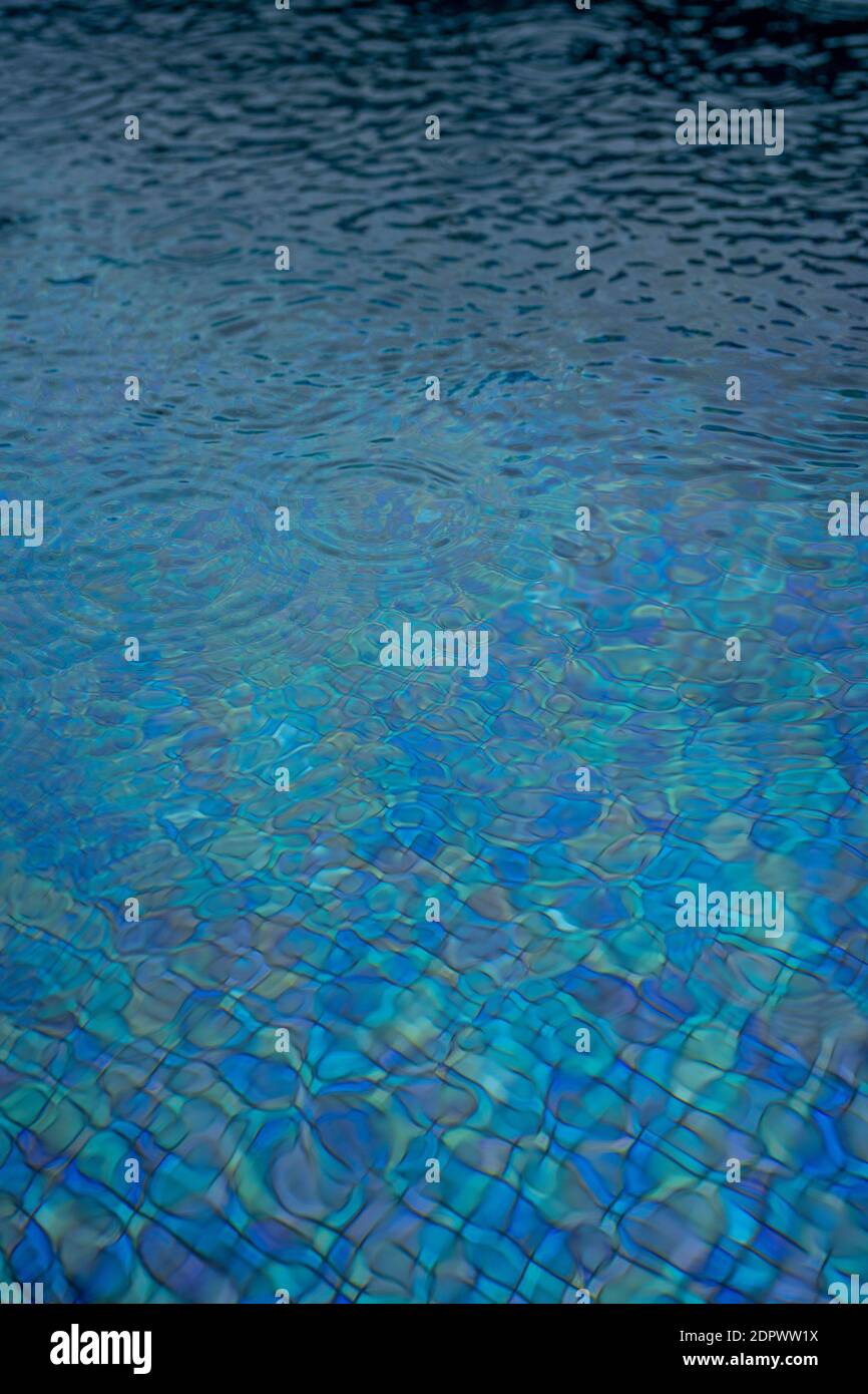 Circle water ripple wave surface background. Rain drop on swimming pool ...