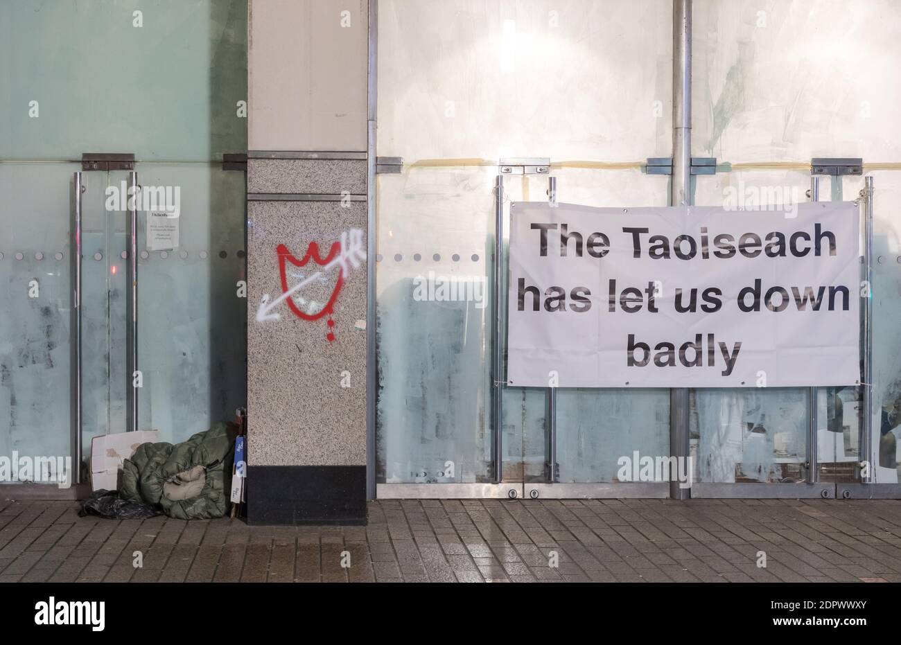 Homeless people in a doorway hi-res stock photography and images - Alamy