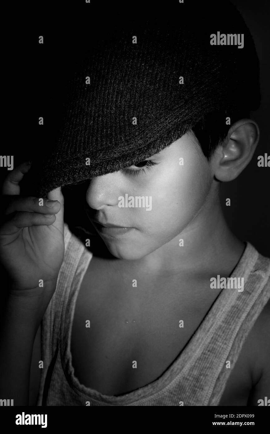 Boy wearing cap Black and White Stock Photos & Images - Alamy