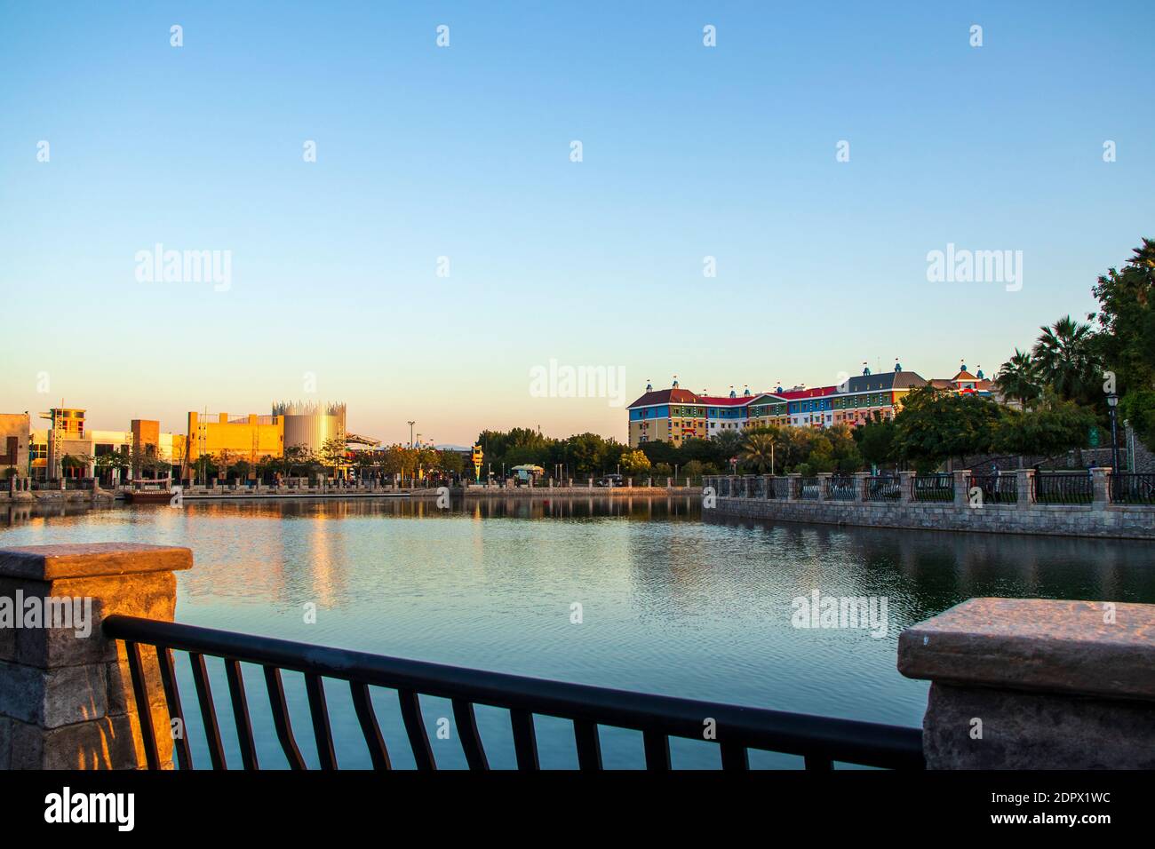 Colorful multi storey building on the lake at Dubai parks and resorts ...