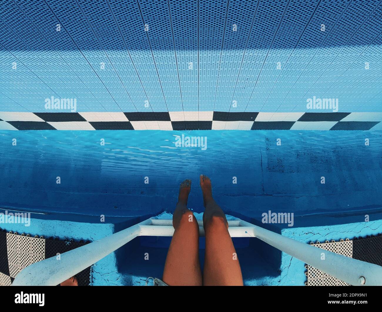Multiple legs and swimming pool hi-res stock photography and images - Alamy