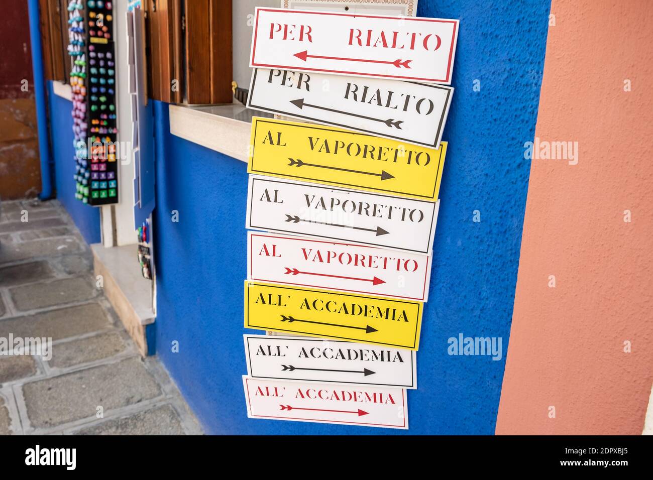 Venice in Italy and the road signs to Saint Mark square and Rialto ...