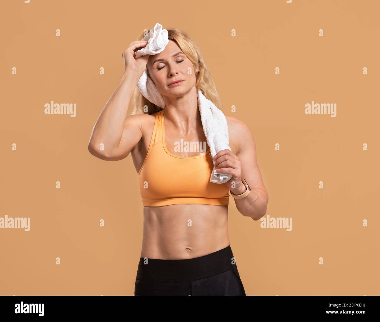 Tired muscular adult lady hi-res stock photography and images - Alamy