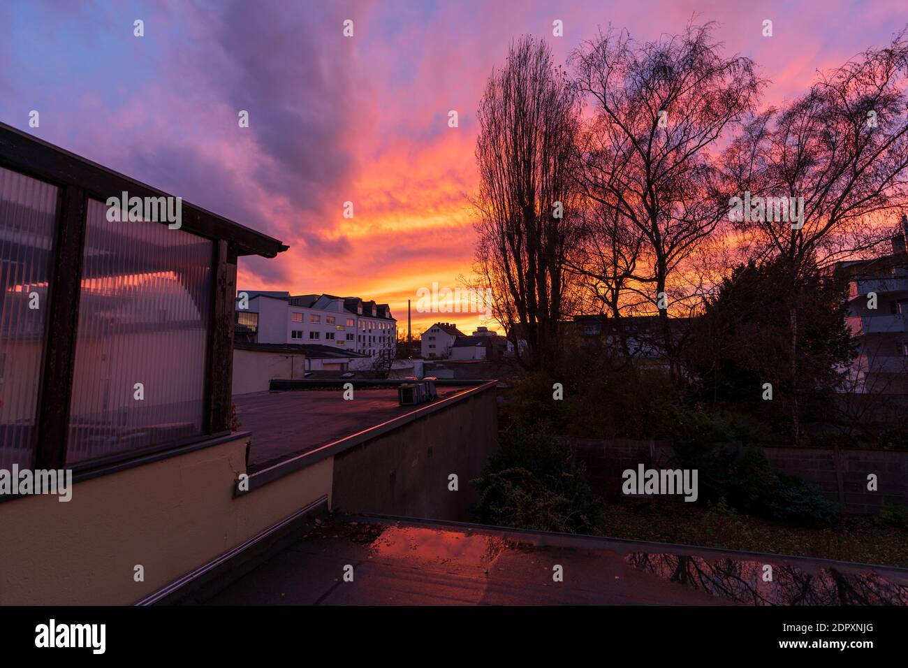 Rain clouds sunset over city hi-res stock photography and images - Alamy