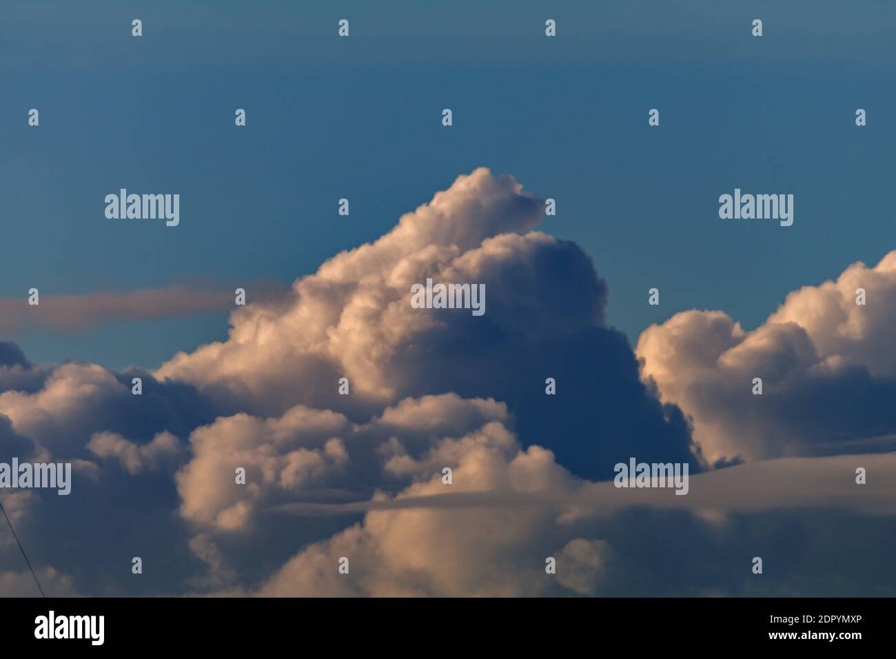 Cumulus clouds taken from the lounge window western court Stock Photo ...
