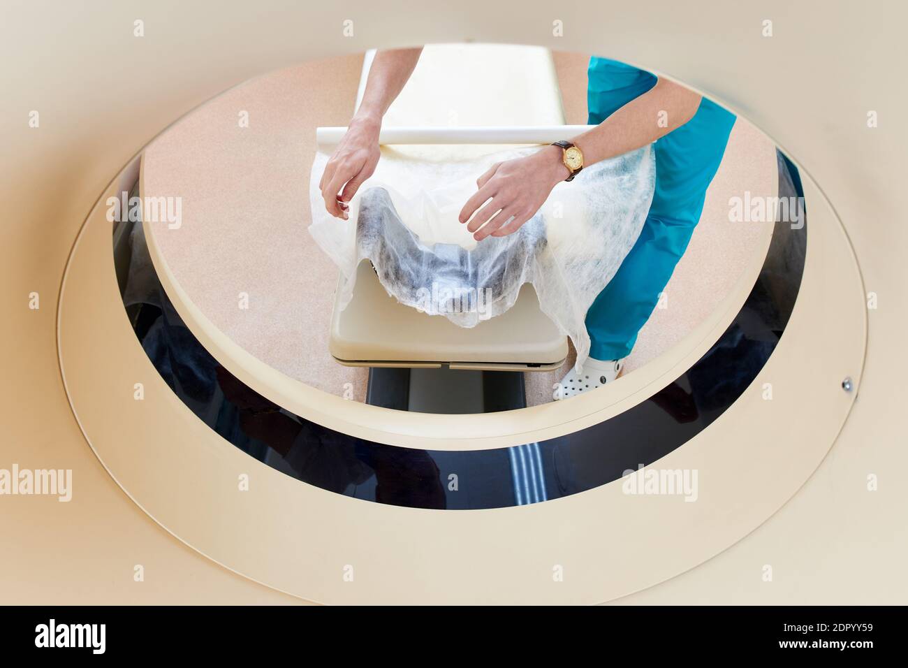Doctor preparing CAT scanner. mri machine in modern medical hospital ...
